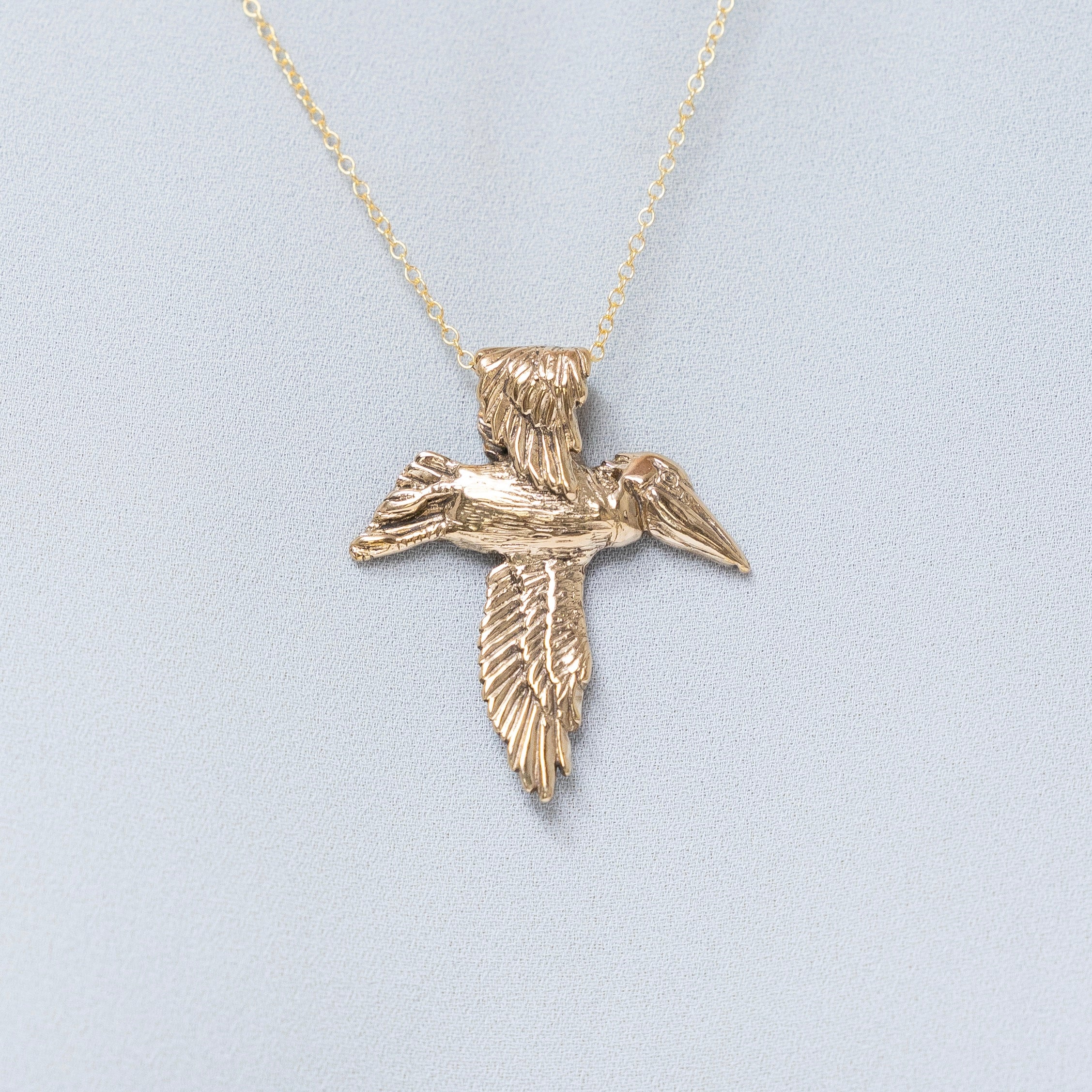 Bronze Pelican Cross Pendant – Jose Balli | New Orleans